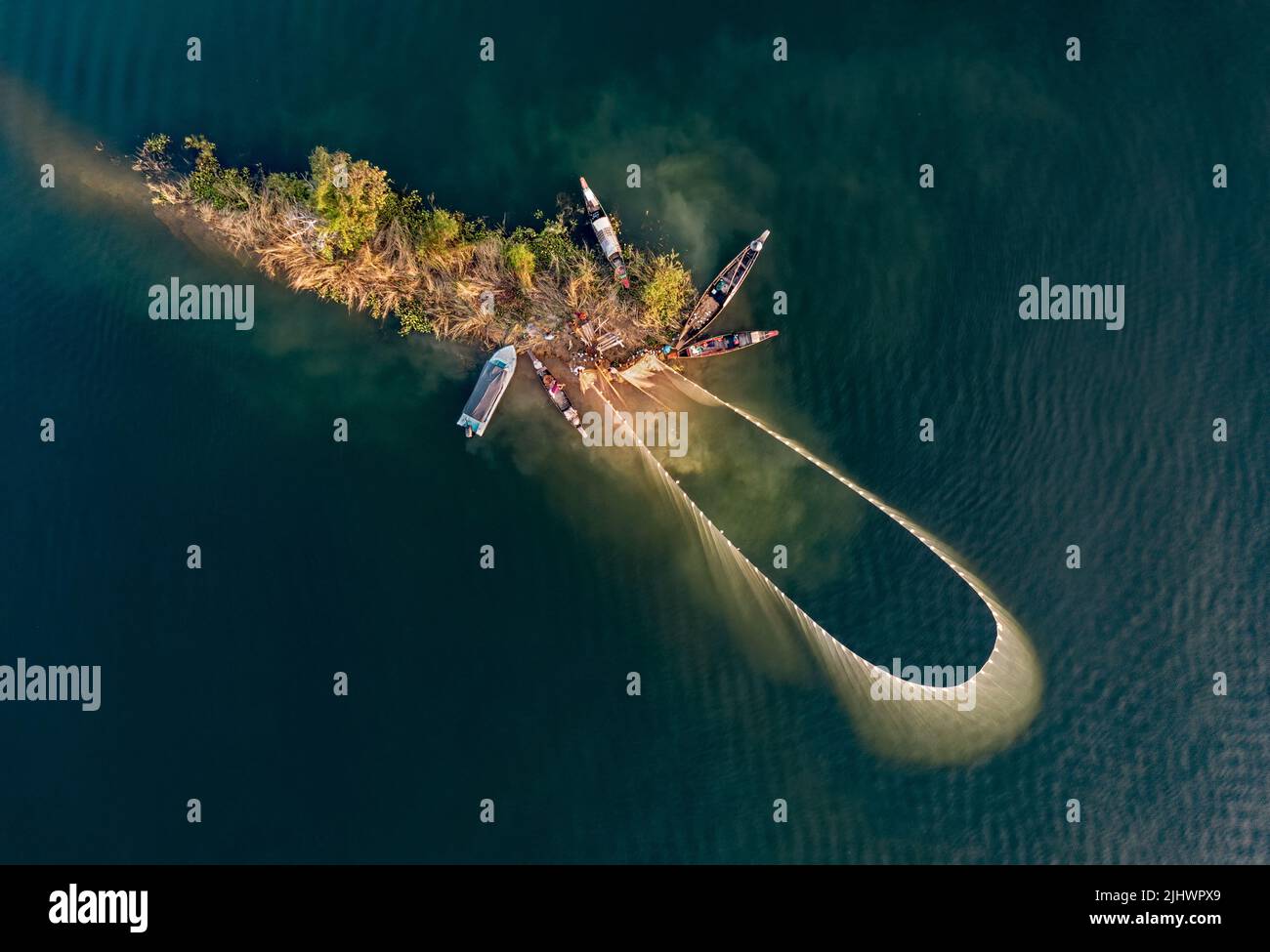 Fishermen casting huge nets in rivers and lakes, captured by drone ...