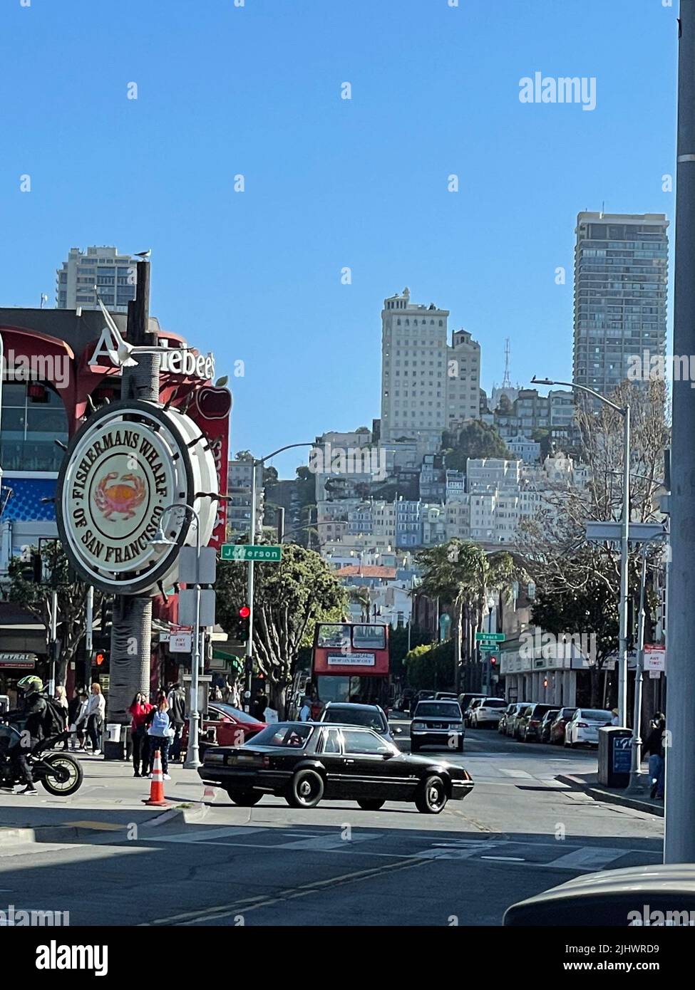 A beautiful view of the Fishermans Wharf Sign with skyline behind Stock ...