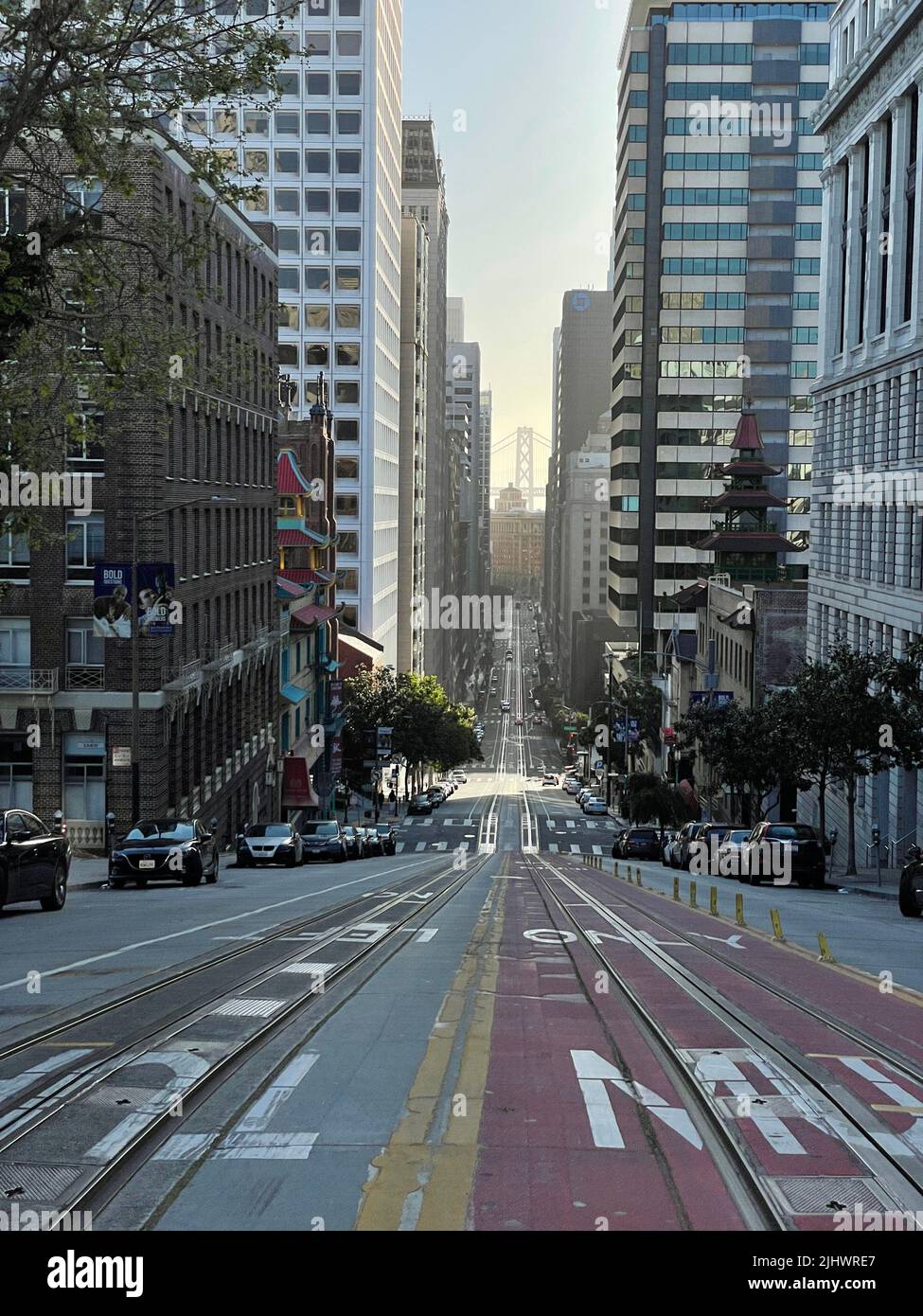 A view of the Bay Bridge through the streets and cable car tracks Stock ...