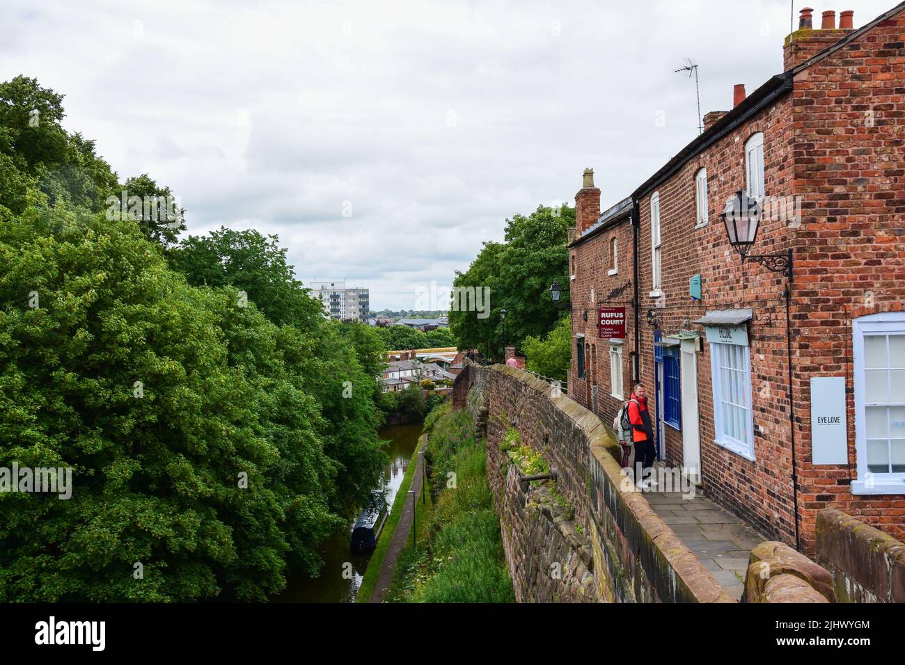 Chester, UK; Jul 3, 2022; The Roman Chester City Walls with the canal ...