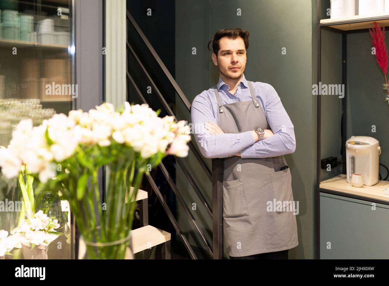 owner of a small business selling fresh flowers and bouquets Stock ...