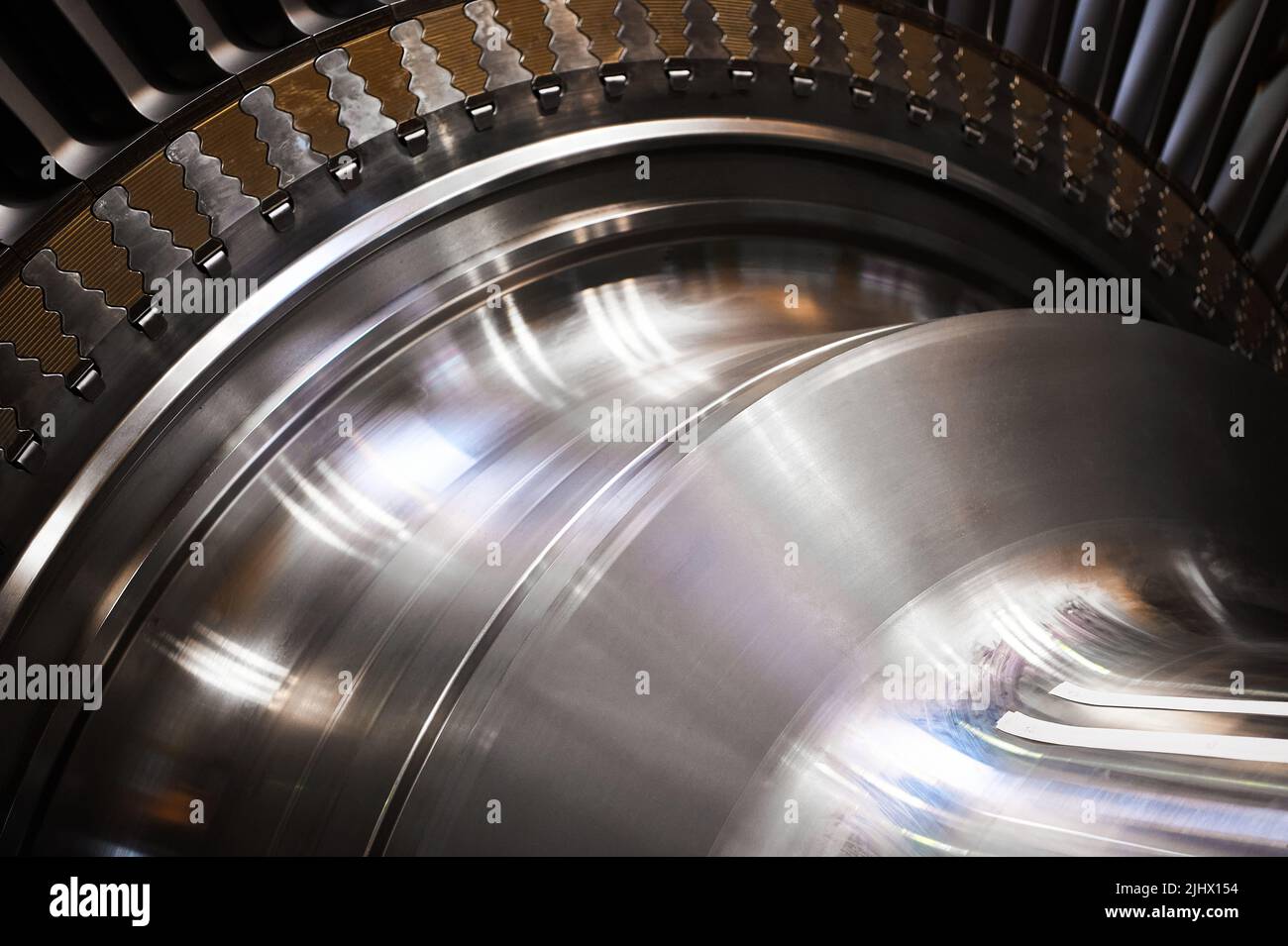 Powerful steam turbine shaft with installed long blades Stock Photo - Alamy