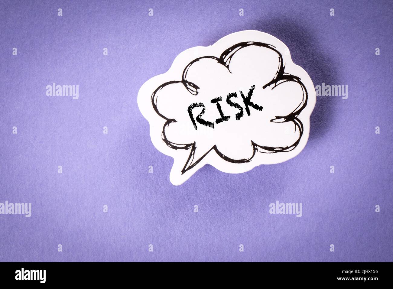 RISK concept. Speech bubble with text on purple background Stock Photo ...
