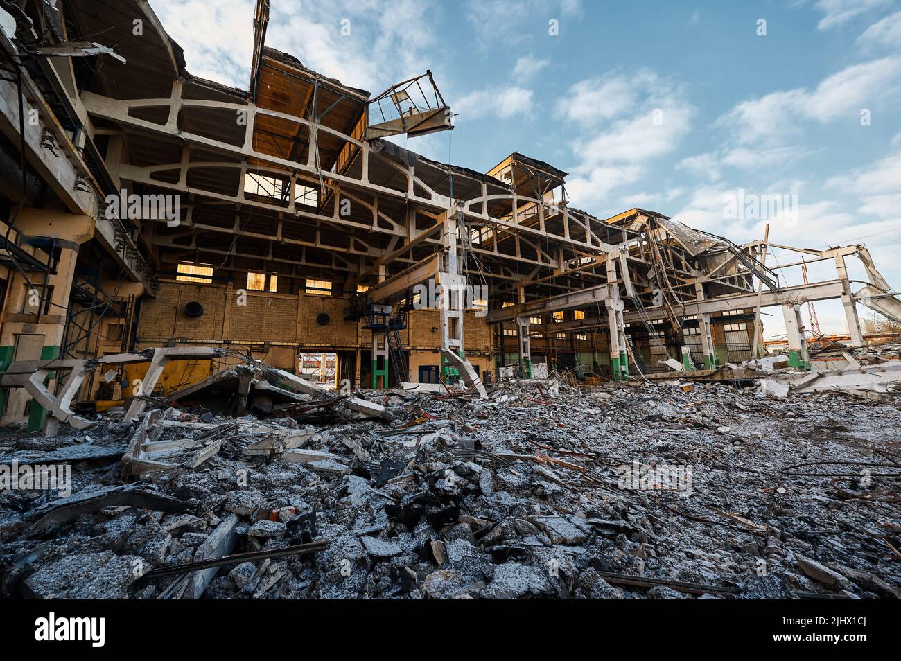 Part of destroyed industrial building at demolition site Stock Photo ...