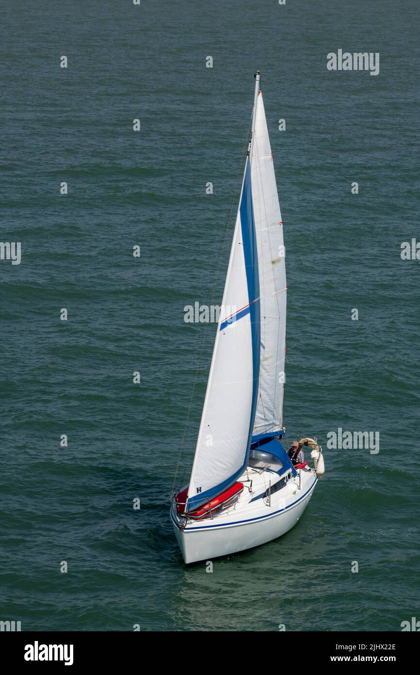 modern sailing yacht under sail on the solent uk Stock Photo - Alamy