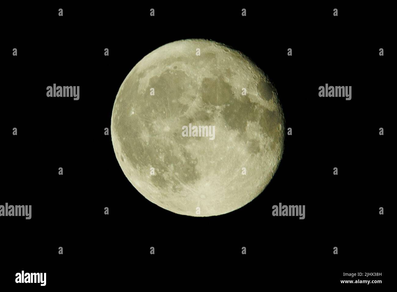 A beautiful scene of the full moon in night sky Stock Photo - Alamy
