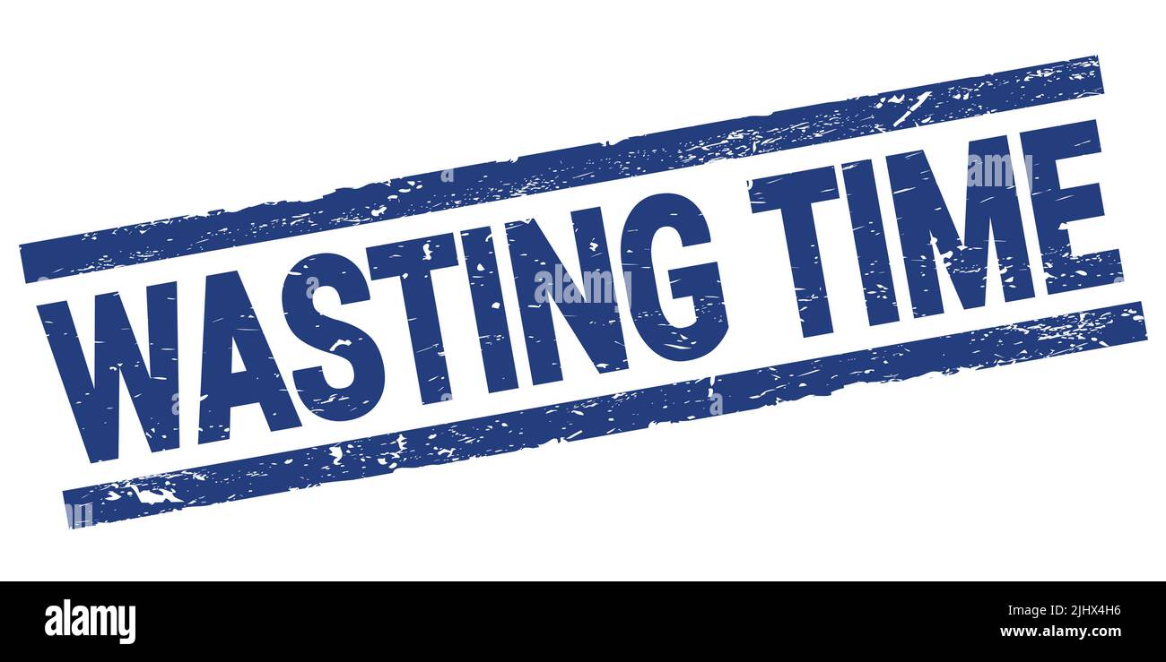 WASTING TIME text written on blue rectangle stamp sign Stock Photo - Alamy