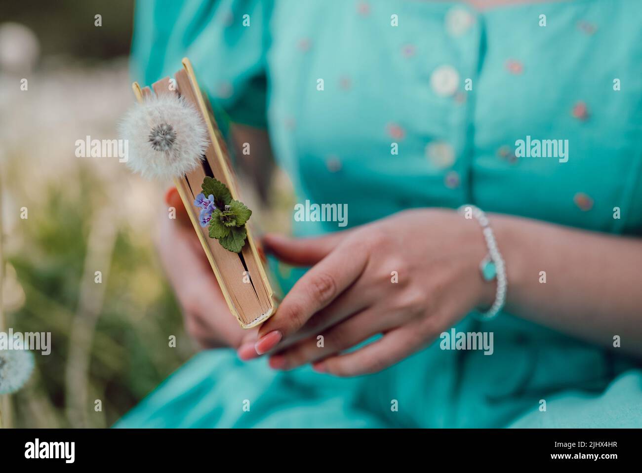 Person turns pages book home hi-res stock photography and images - Alamy