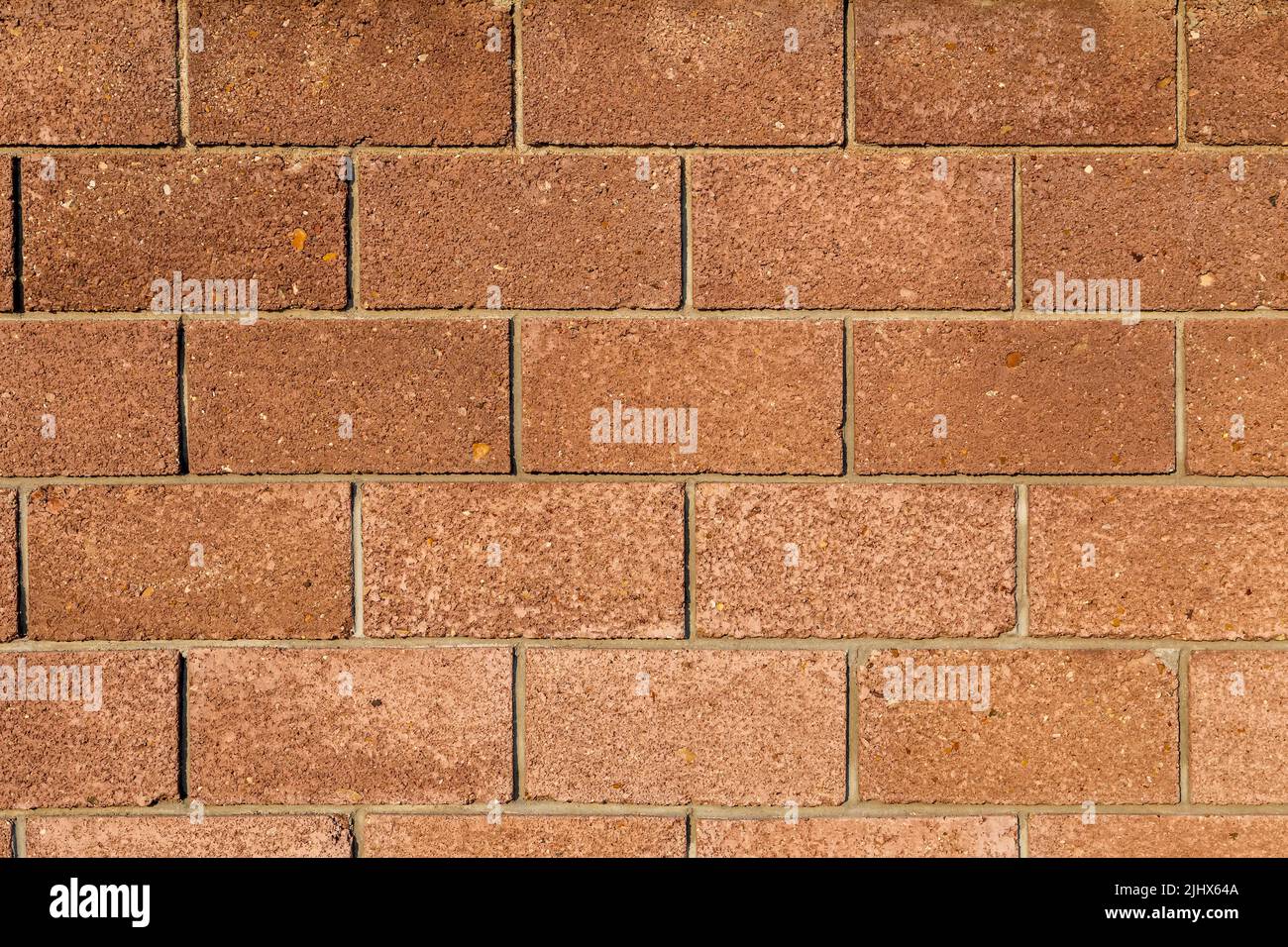 Texture - a small part of the wall of the building, lined with red ...