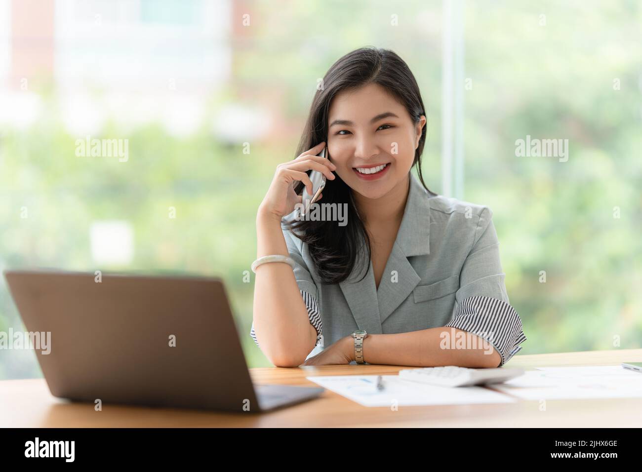 Image of Happy Asian Business woman discussing with her business ...