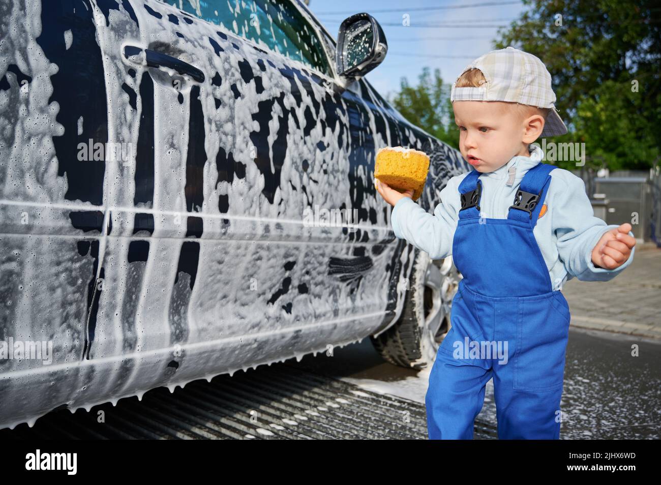 Black child cleaning hi-res stock photography and images - Alamy