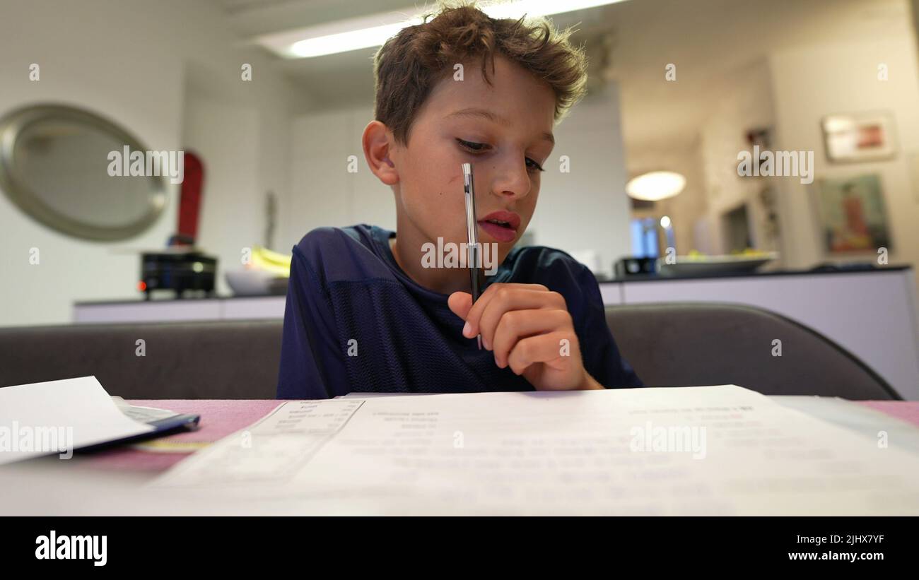 Young boy doing homework after school. Kid preparing for exam Stock ...