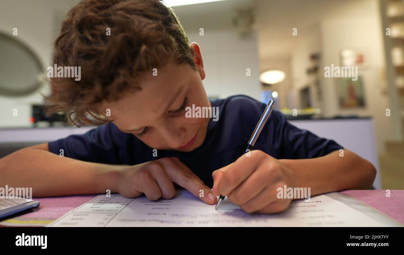 Young boy doing homework after school. Kid preparing for exam Stock ...