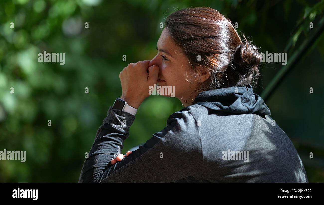 Woman rubbing nose. girl scratching face with hand Stock Photo - Alamy