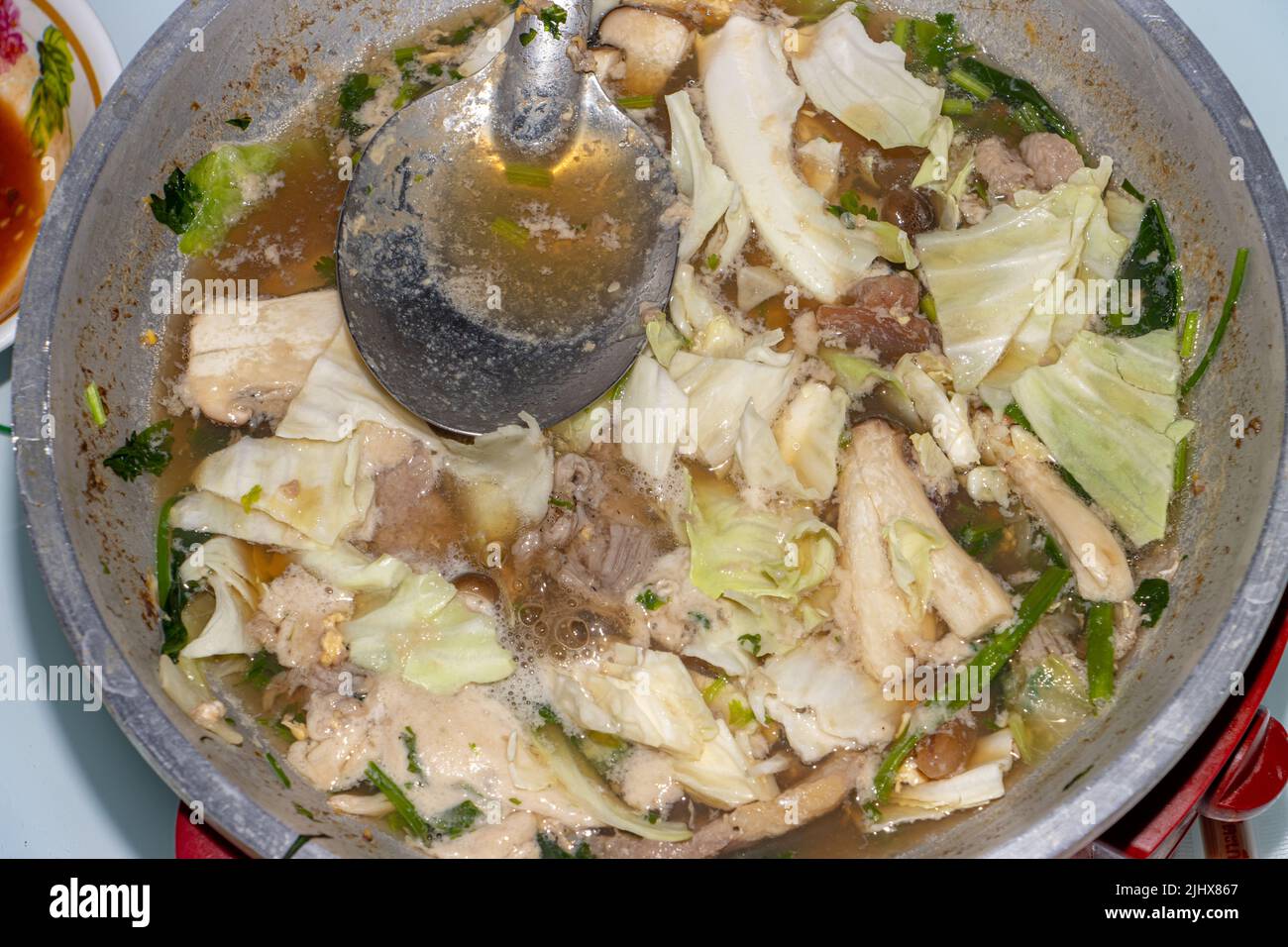 A traditional Suki soup - Sukiyaki in a pot Stock Photo - Alamy