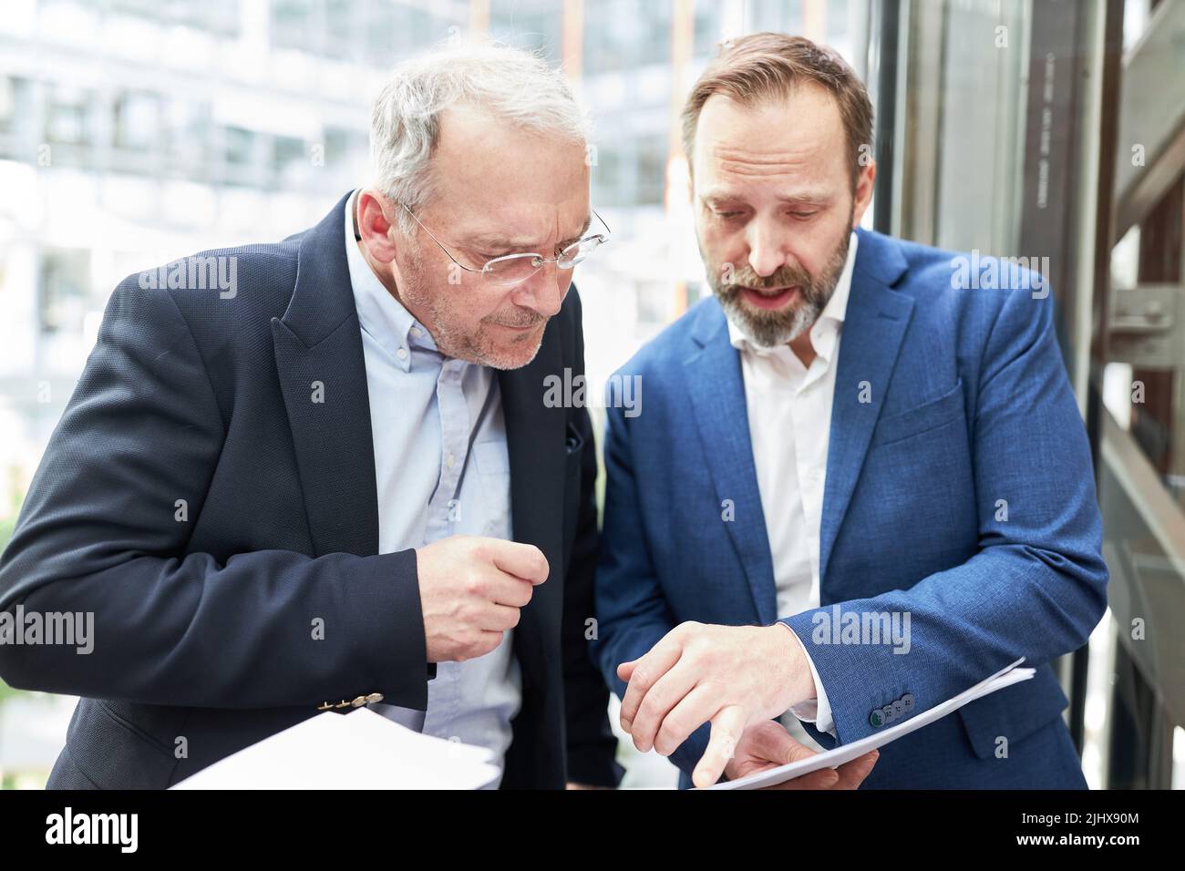Two business colleagues planning hi-res stock photography and images ...