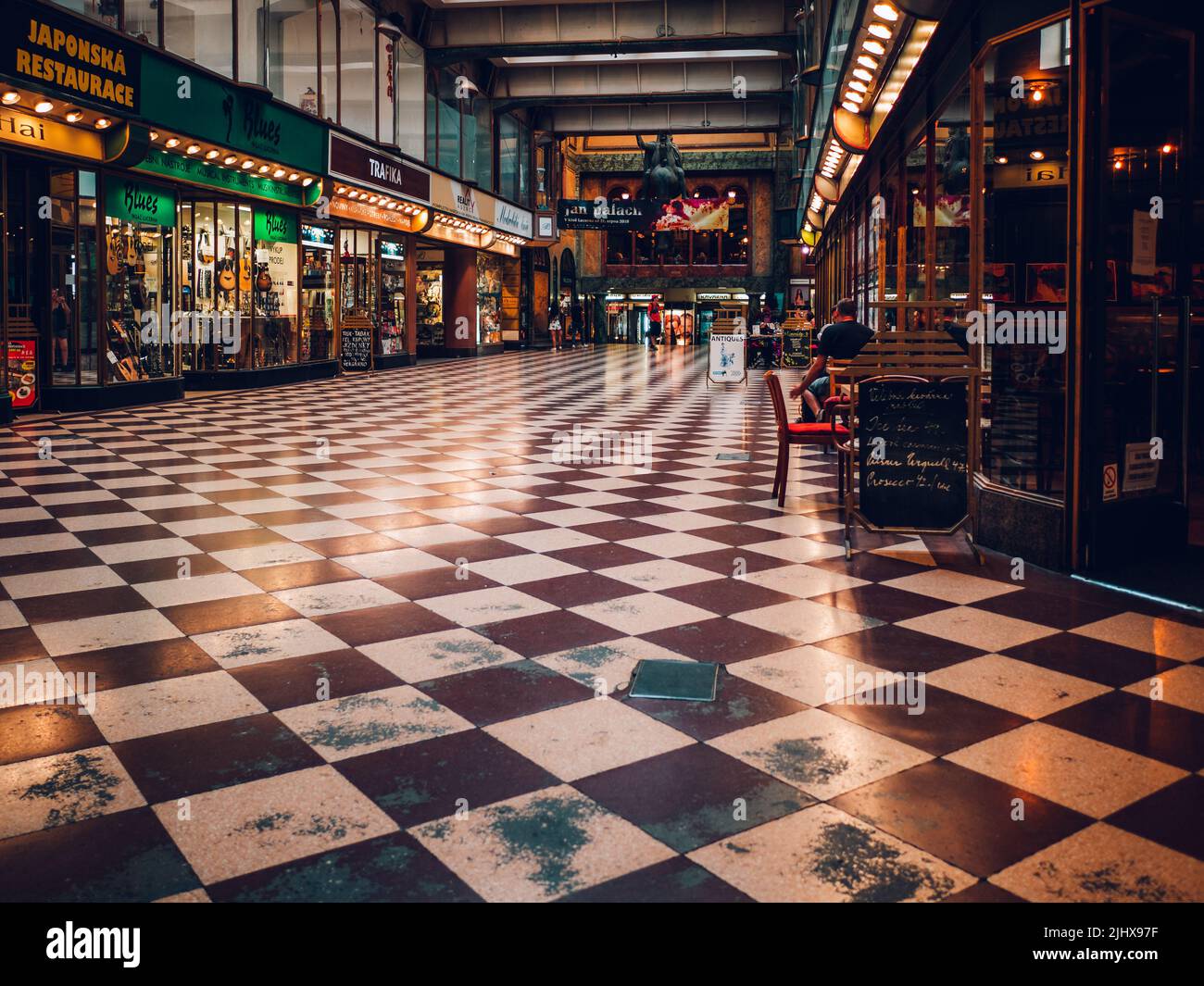 tiled floors and a cool mood in a shopping mall Stock Photo - Alamy