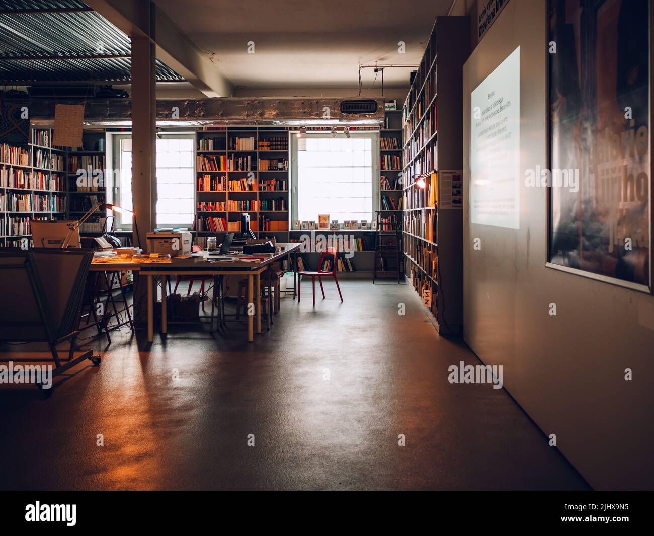 Books and desks in a library Stock Photo - Alamy