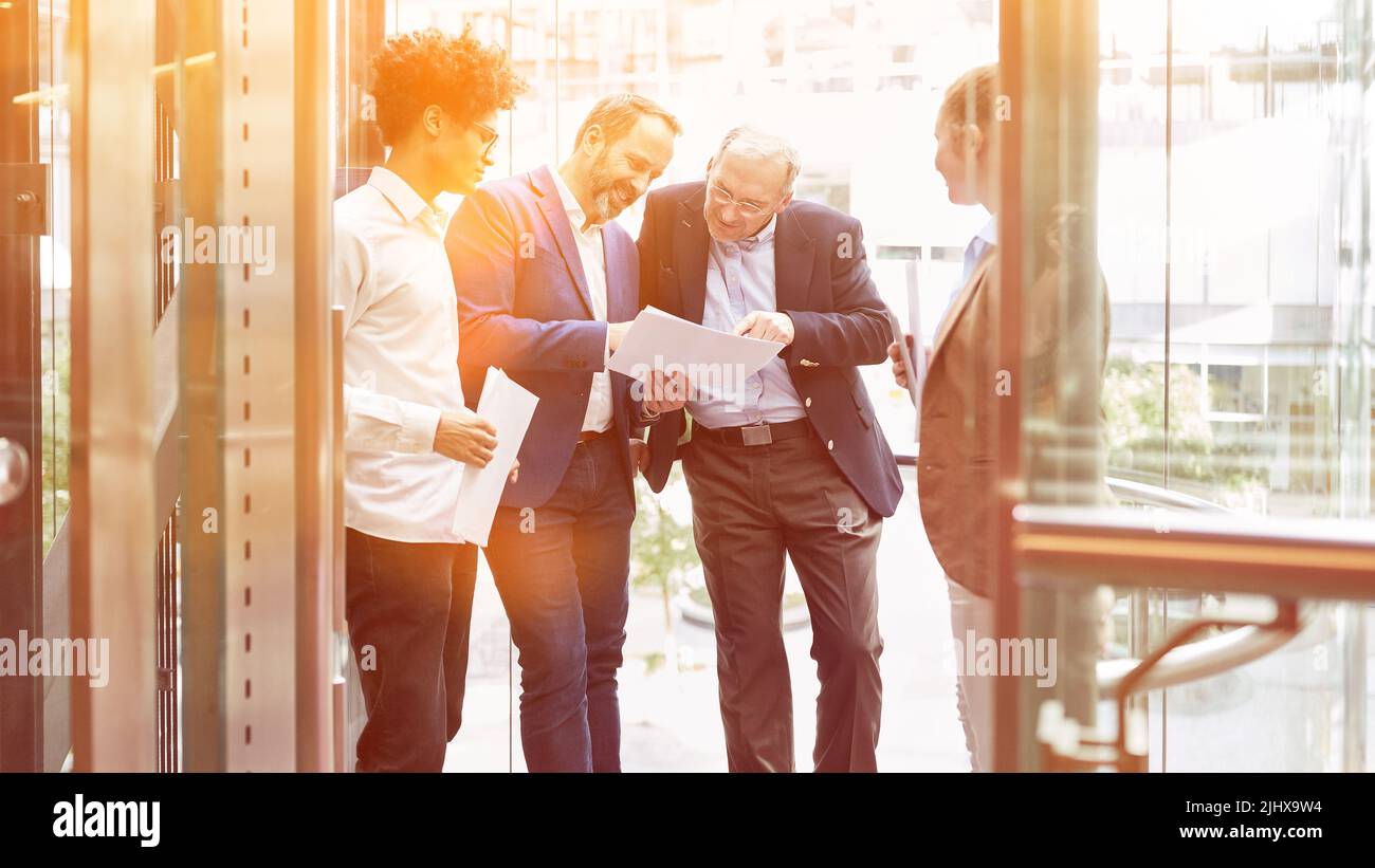 Business team analyzing project hi-res stock photography and images - Alamy