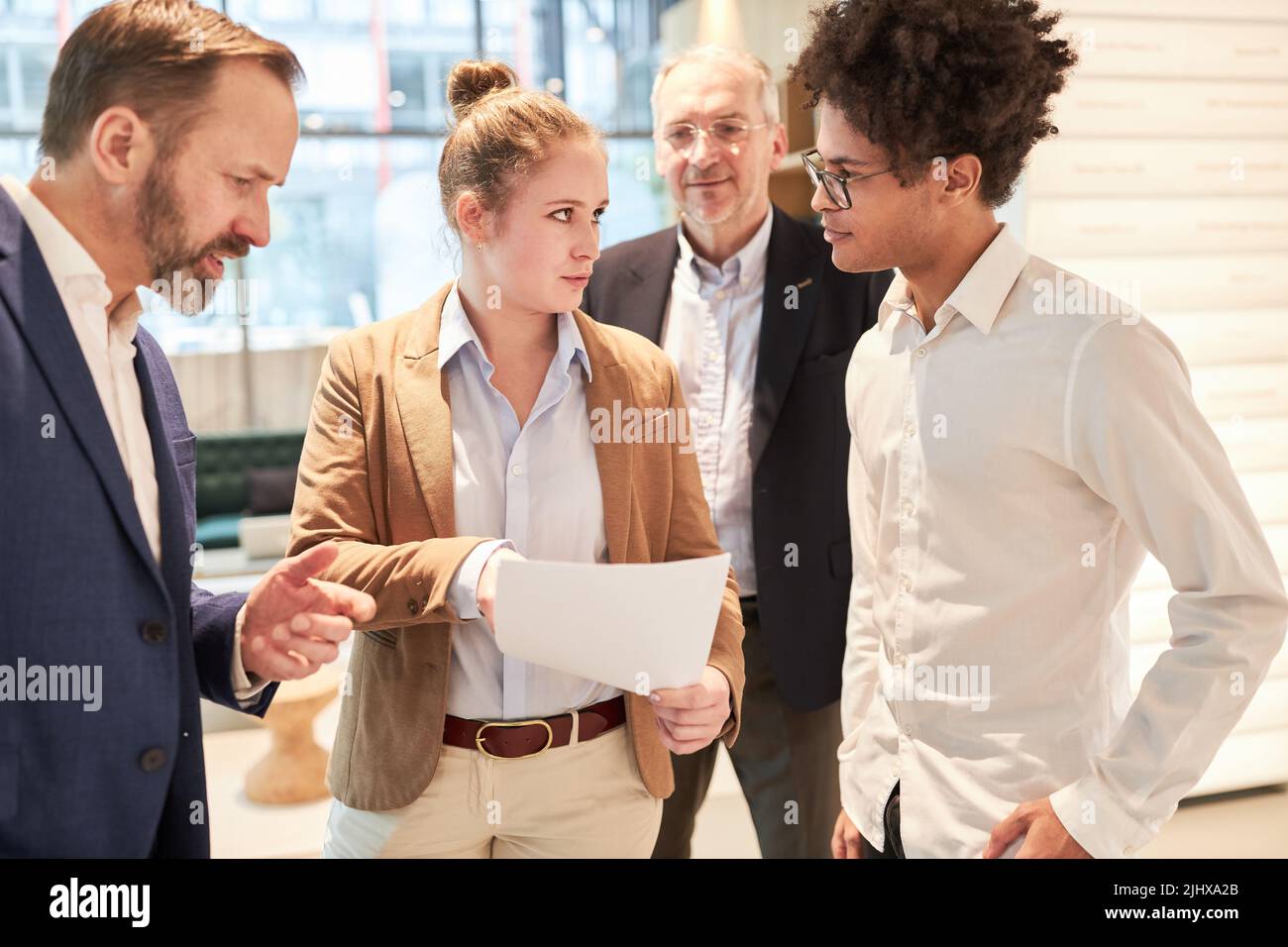 Start-up team people in strategy and project planning with consultant ...