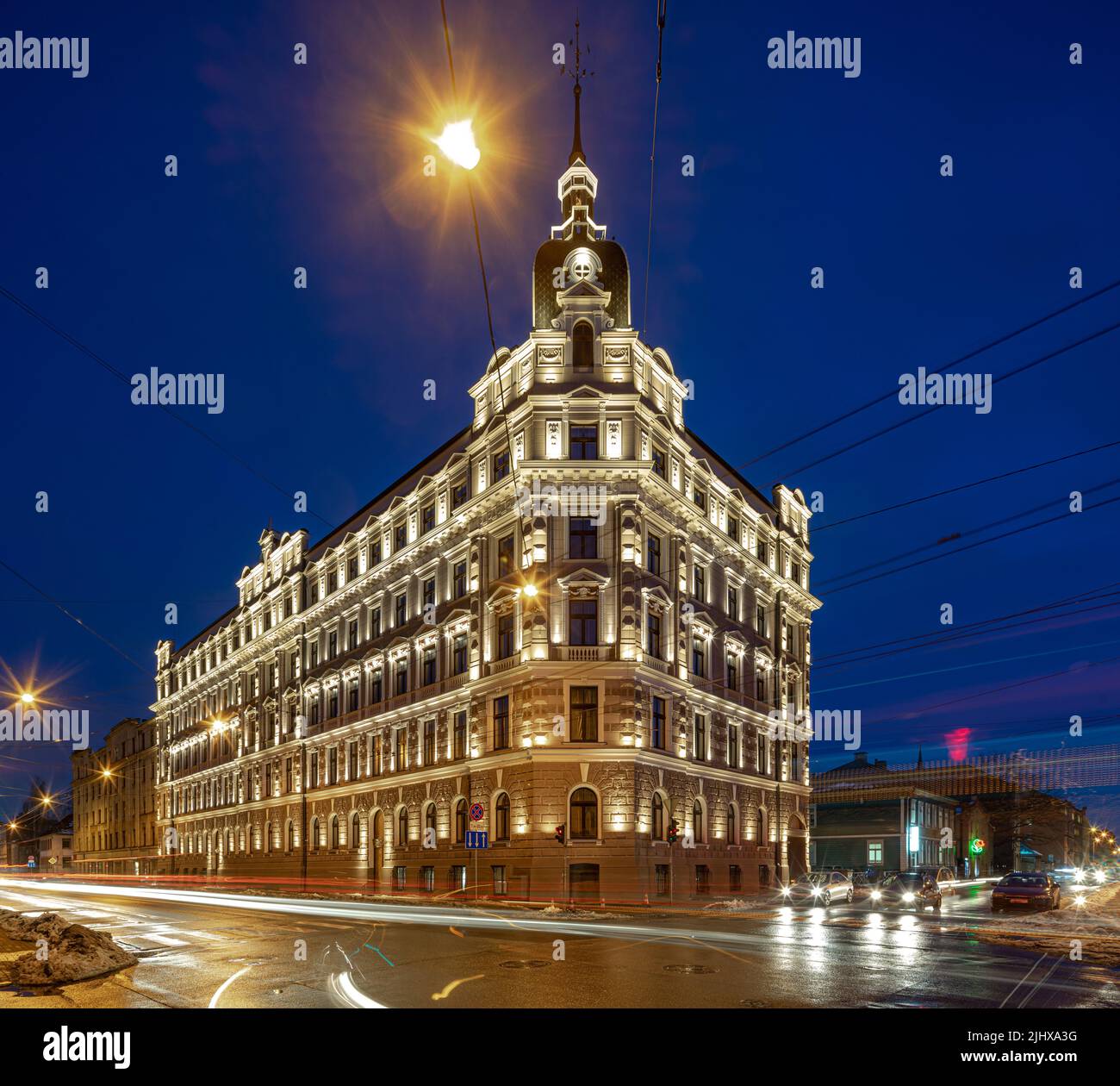 Night cityscape of Riga. Modern architecture. Lights on long exposure ...