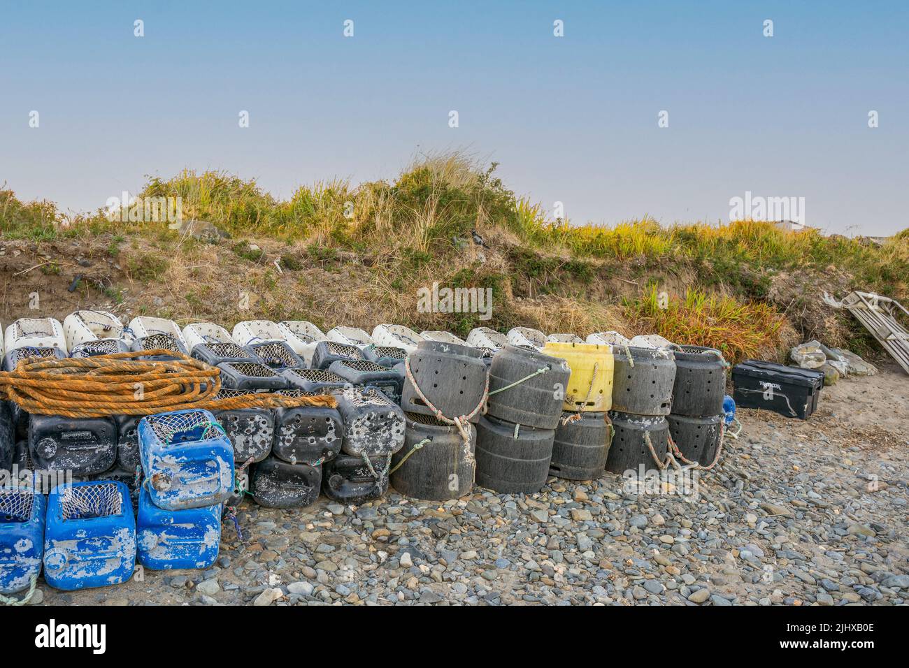 old fishermans lobster pots crab boxes barrels and deflated dingies in ...