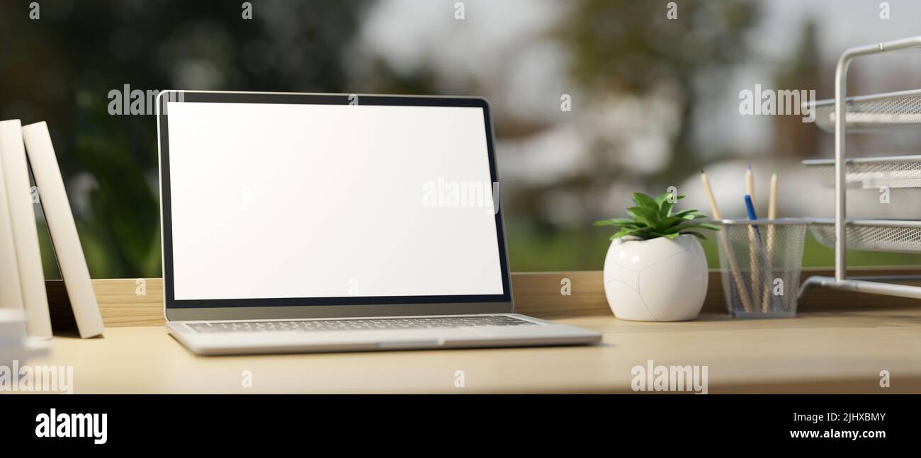 Close-up image. Office working desk with laptop computer white screen ...