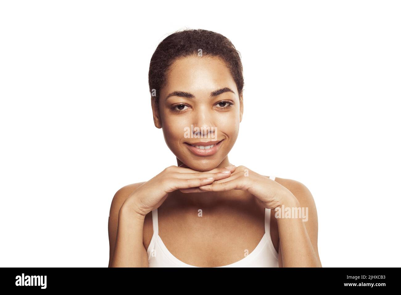 Beauty. Smiling black woman with perfect clean skin and natural makeup ...
