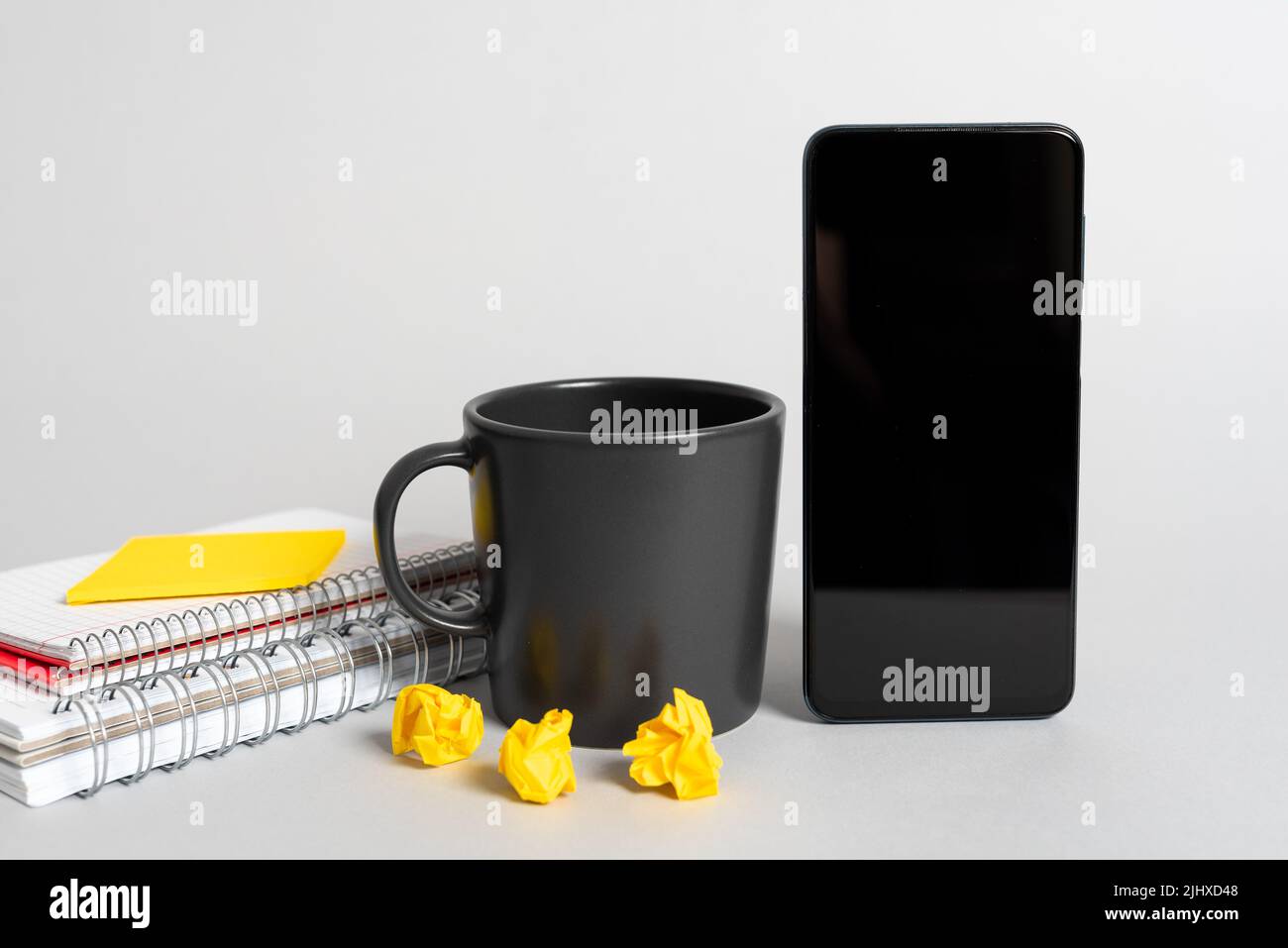 Cup, Notebooks, Sticky Note, Paper Wraps And Phone Screen With ...