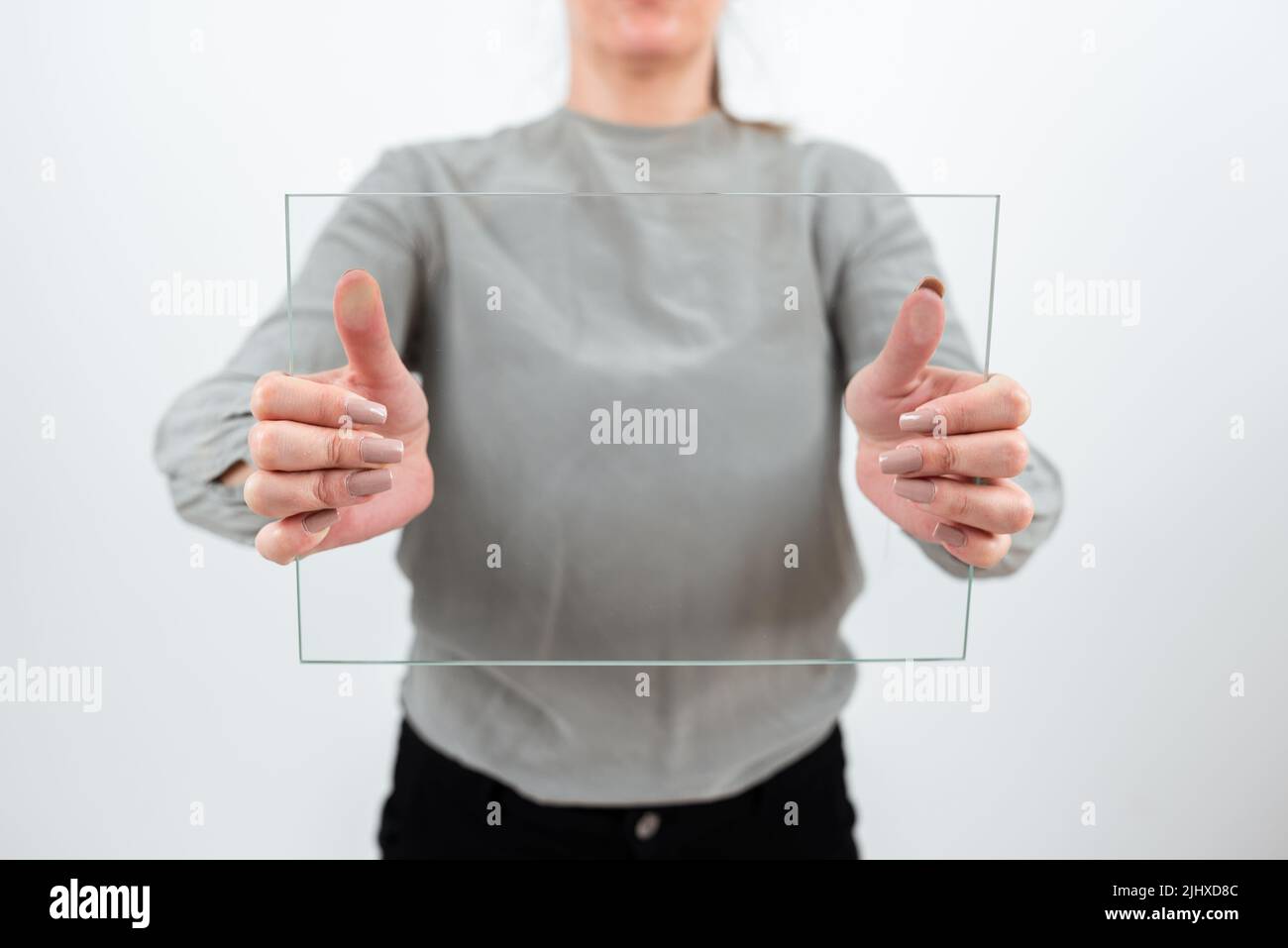 Female Professional Holding Transparent Glass And Displaying Important ...