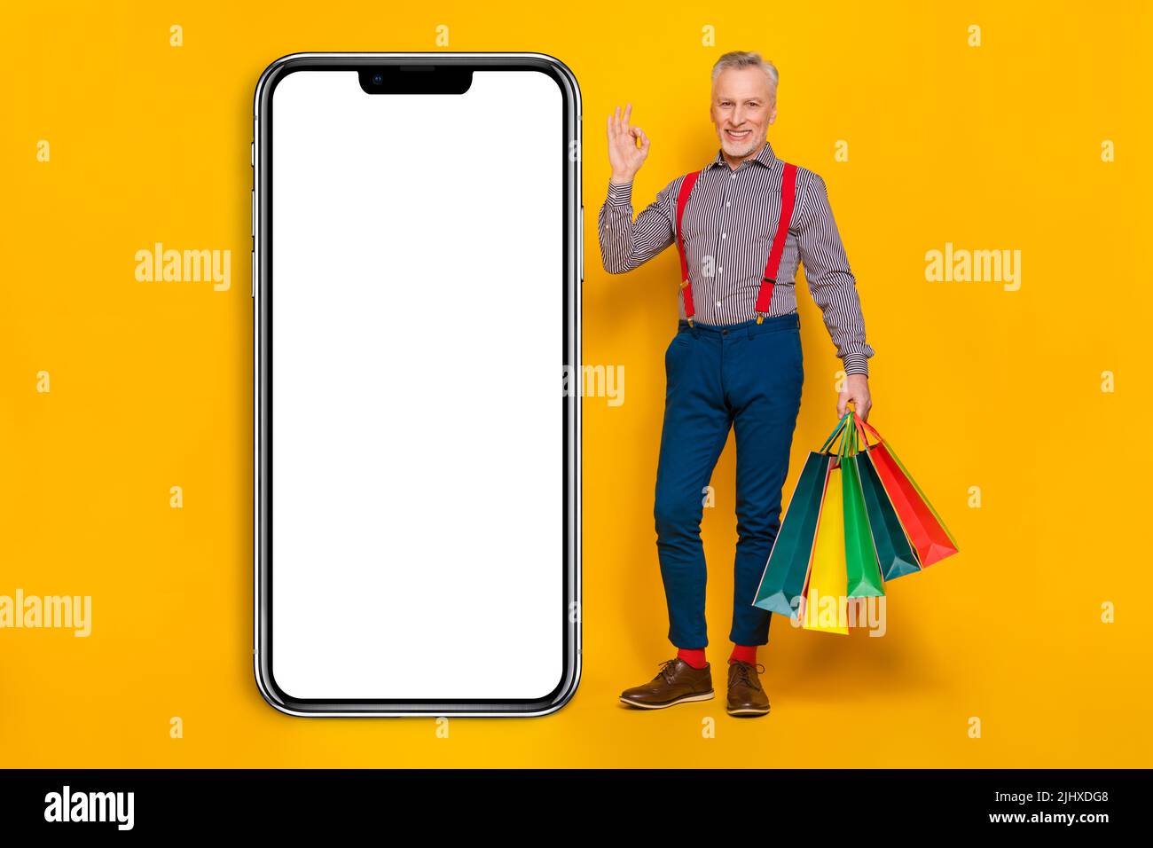 Full length photo of handsome mister showing okay symbol go shopping ...