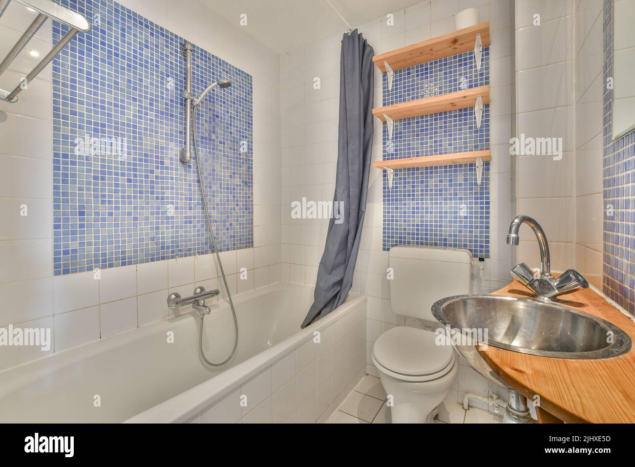 Modern home interior design of white bathroom with open bathtub and ...