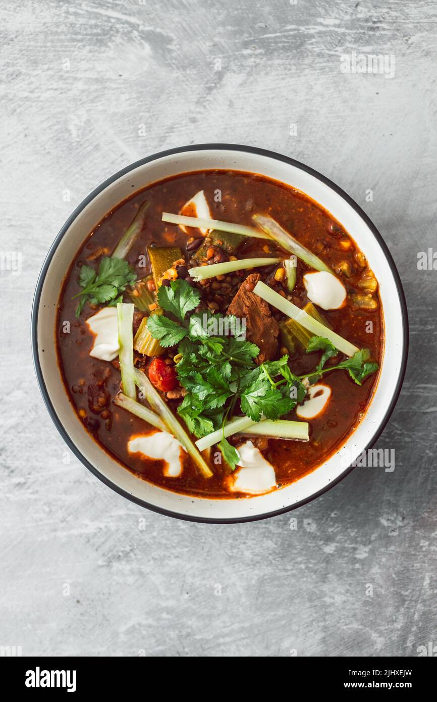 plant-based Mexican vegetable stew with beans mock meat celeri and ...