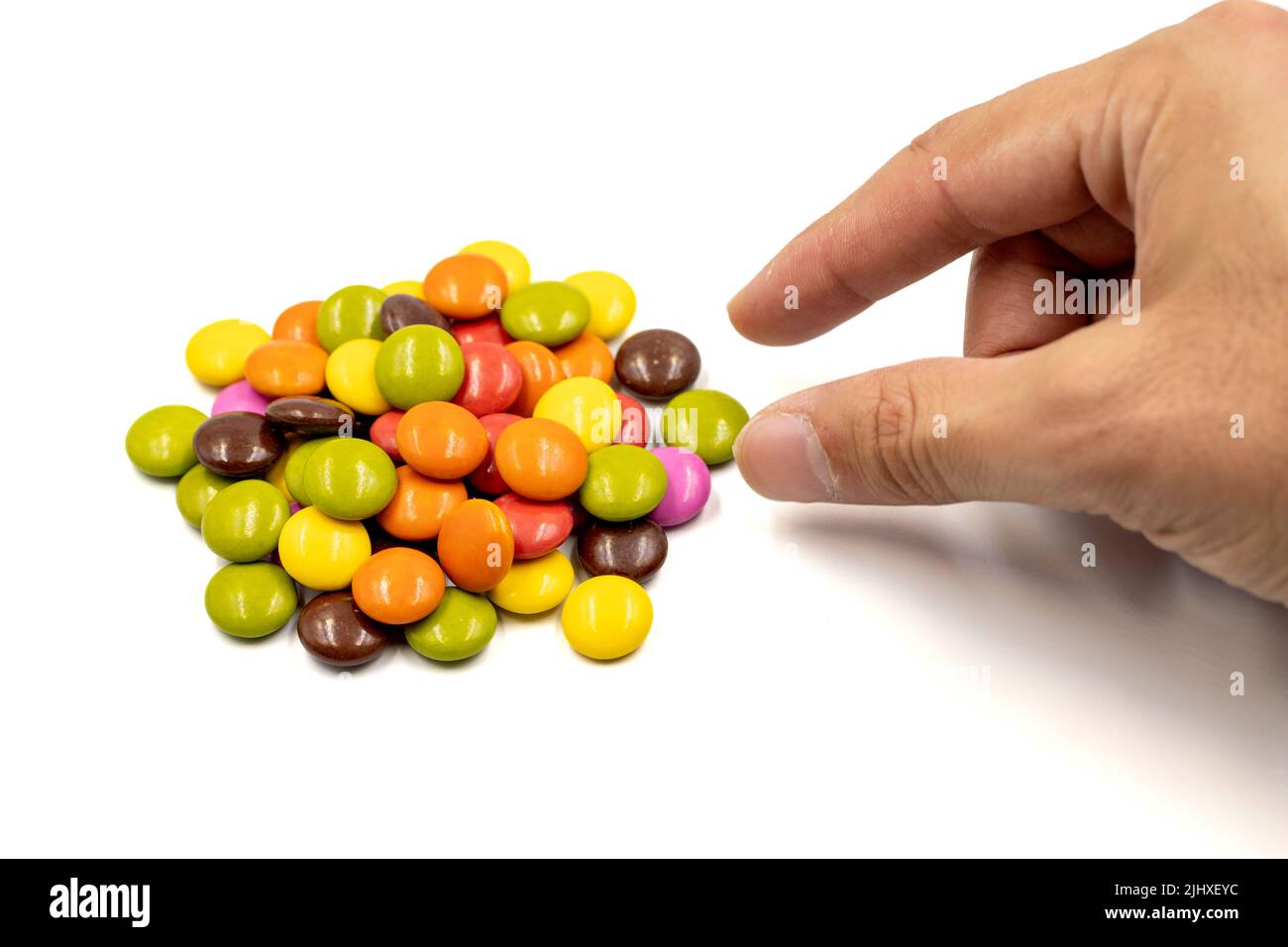 Red hand reaching for pill hi-res stock photography and images - Alamy