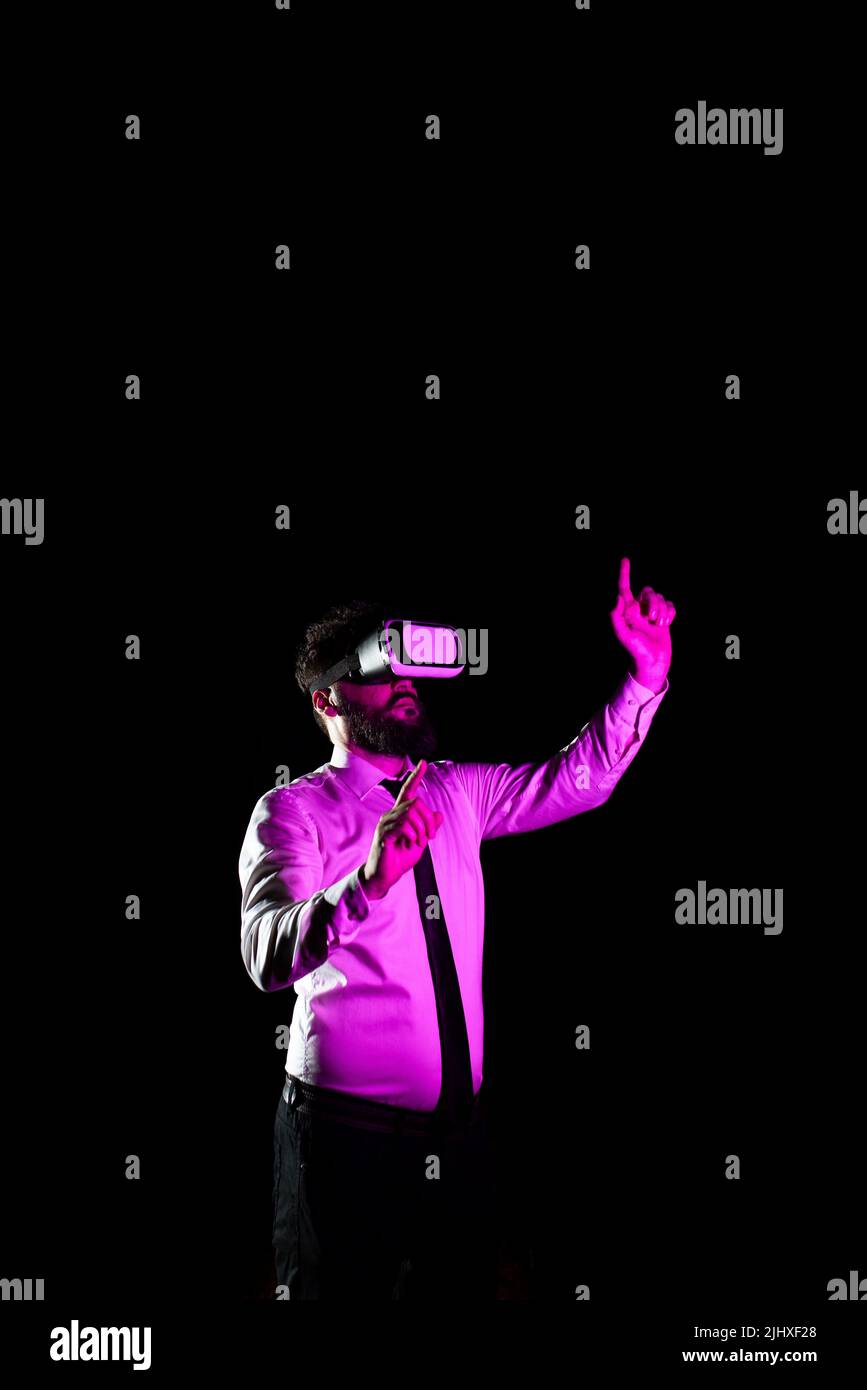 Businessman Using Virtual Reality Goggles Gesturing While Taking ...