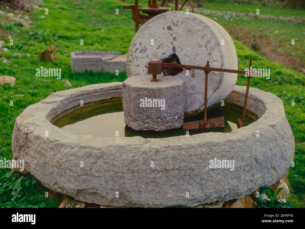 Ancient stone water wheel mill, Cyprus Stock Photo - Alamy