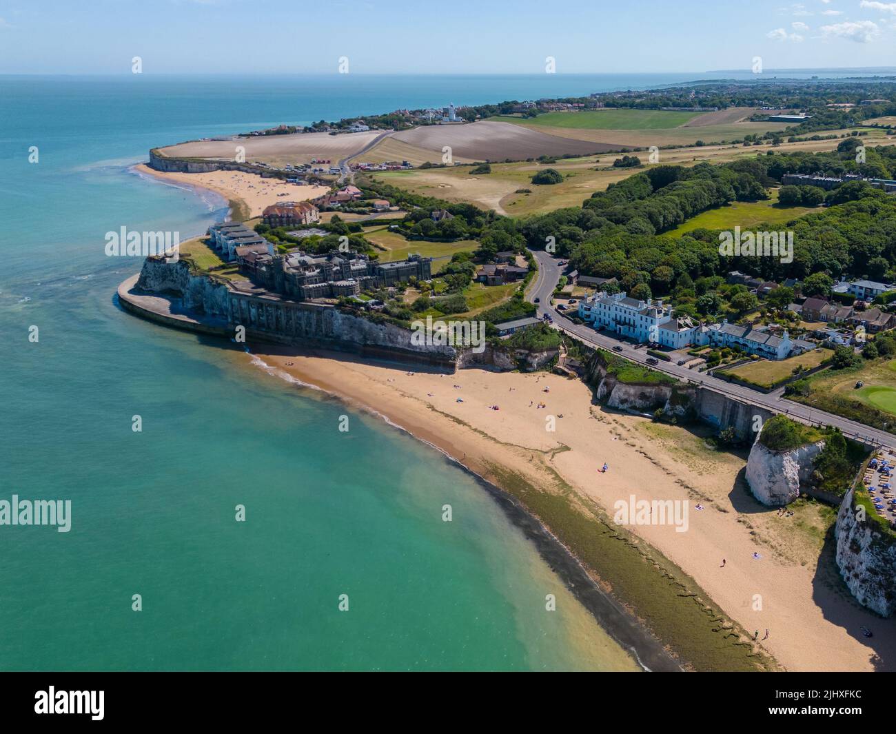 Aerial view from a drone Kingdgate Bay Kent beach seaside town golden ...