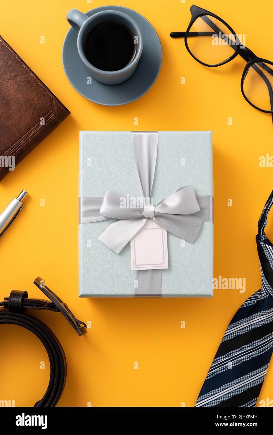 Father's day gift idea design concept with gift box on yellow ...