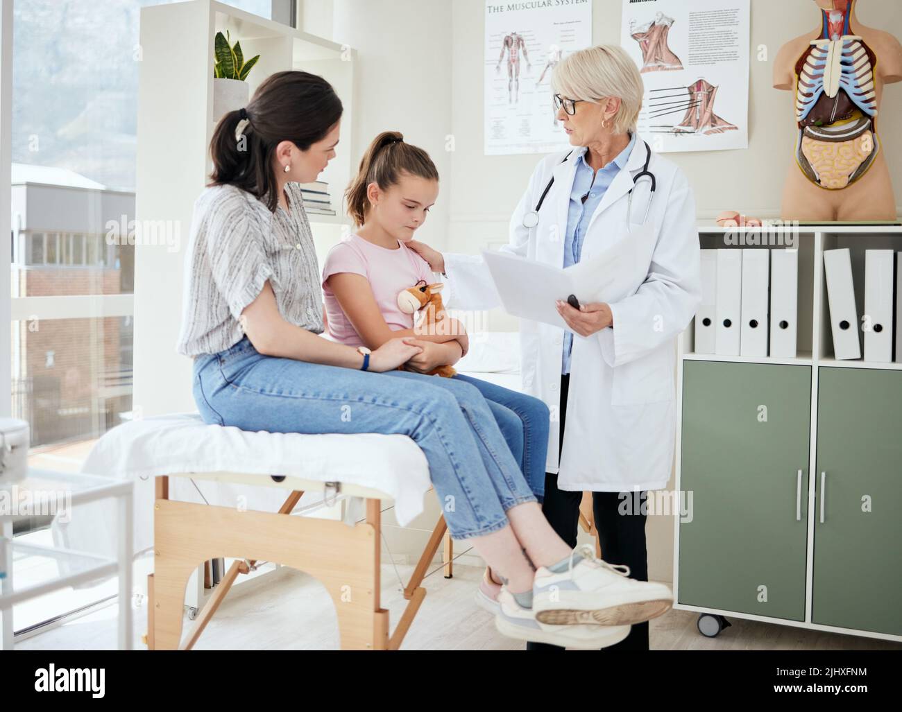 Nothing will get me down. a mature female doctor talking to a patient ...