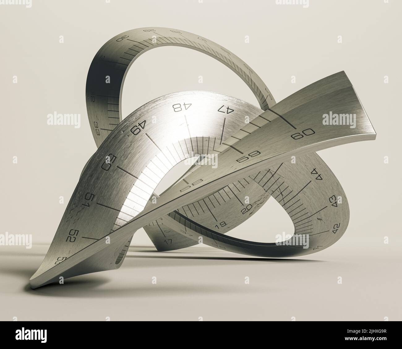 An surreal concept of a curled and twisted up industrial steel ruler ...