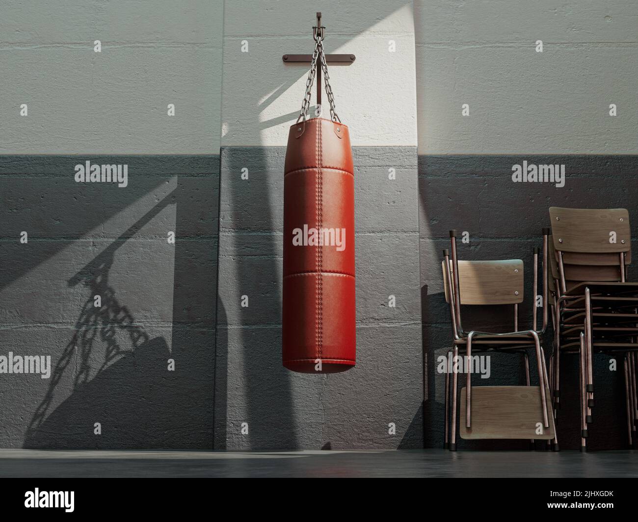 A red leather punching bag mounted on a wall in a room with stacked ...
