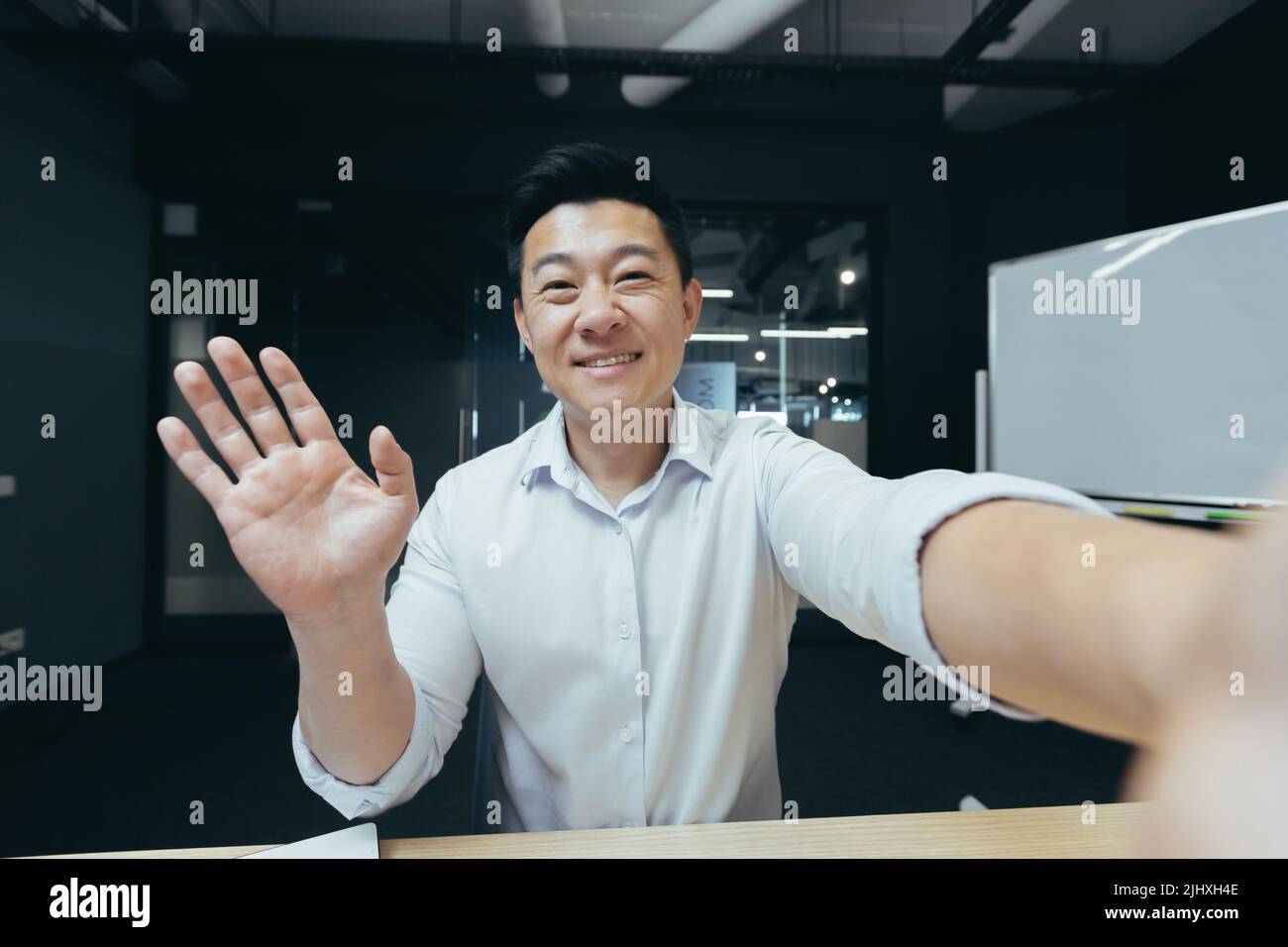 Asian businessman working in modern office, successful man talking on ...