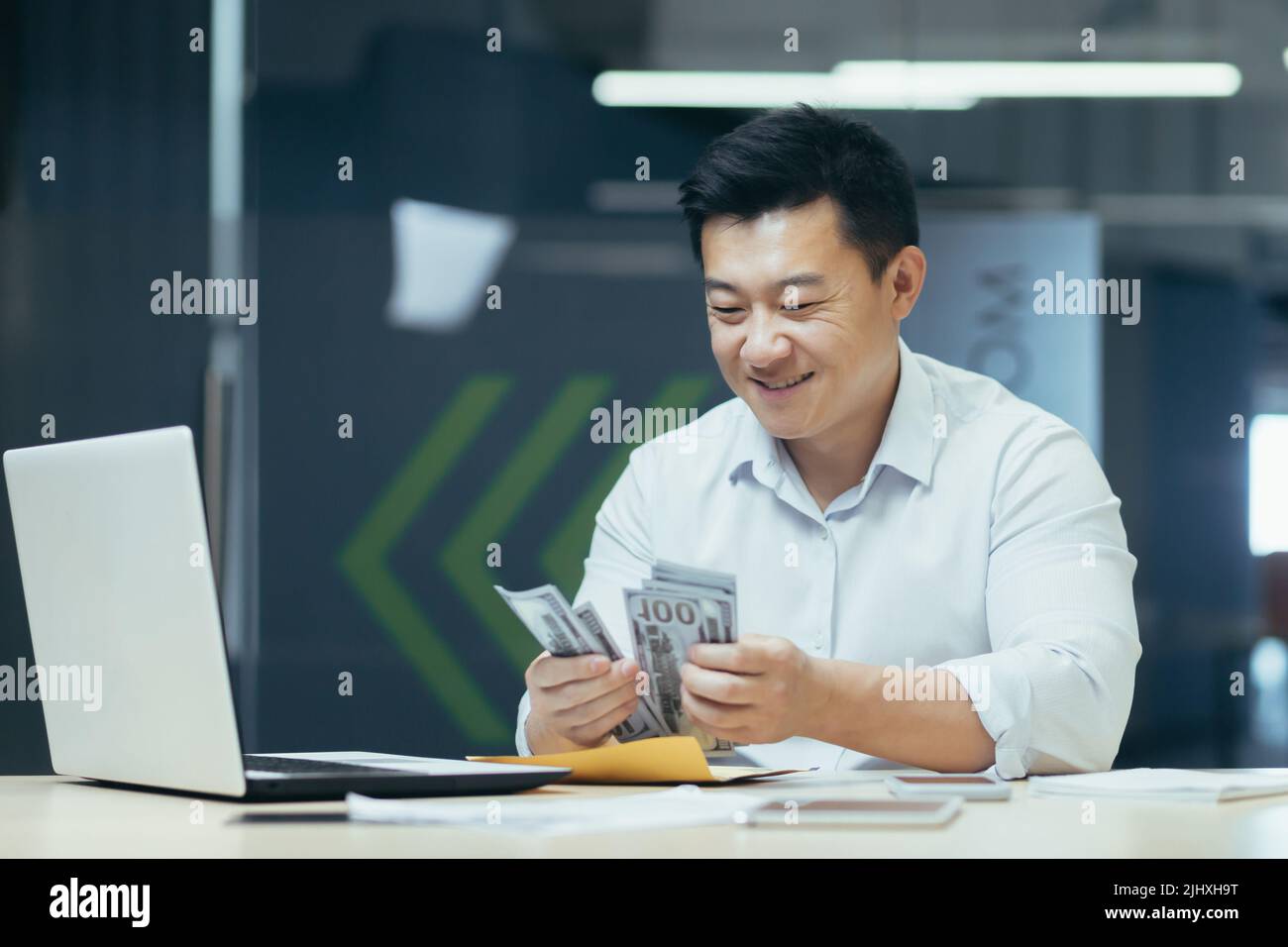 Business person counting money table hi-res stock photography and ...