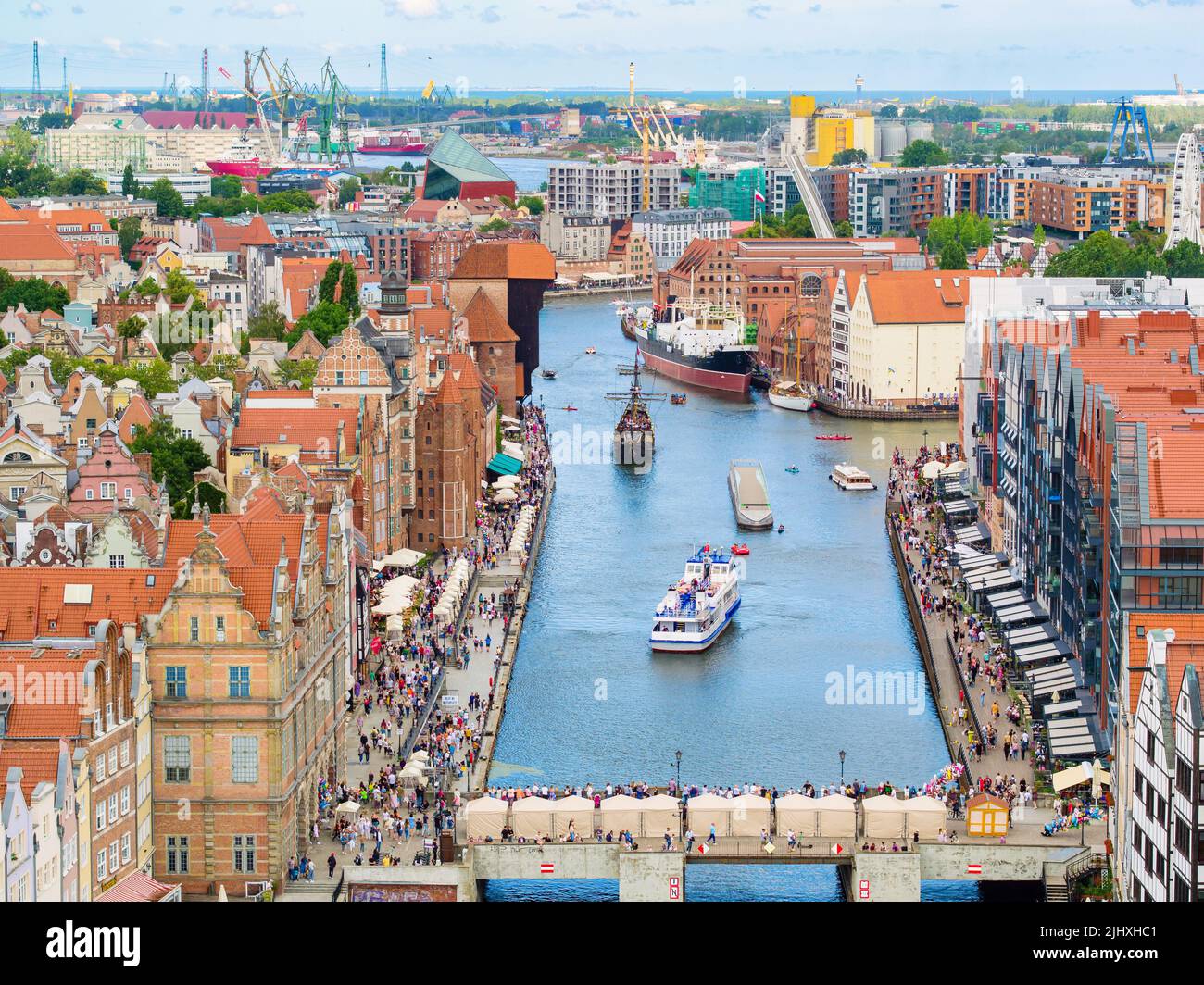 Tourist destination of Gdansk, old buildings in downtown by Motlawa ...