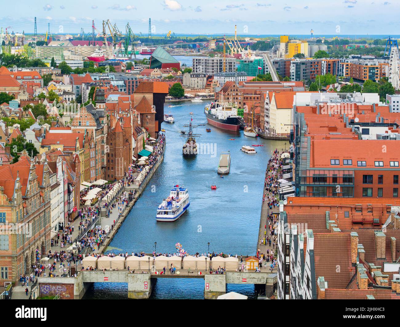 Tourist destination of Gdansk, old buildings in downtown by Motlawa ...