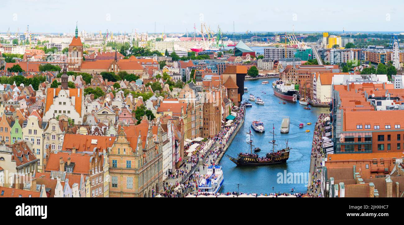 Tourist destination of Gdansk, old buildings in downtown by Motlawa ...