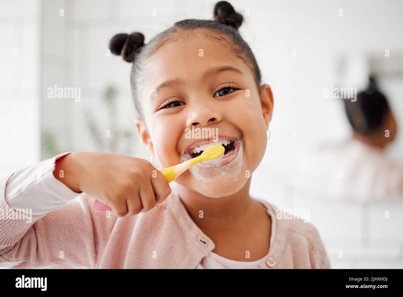 Hispanic Child Brushing Teeth