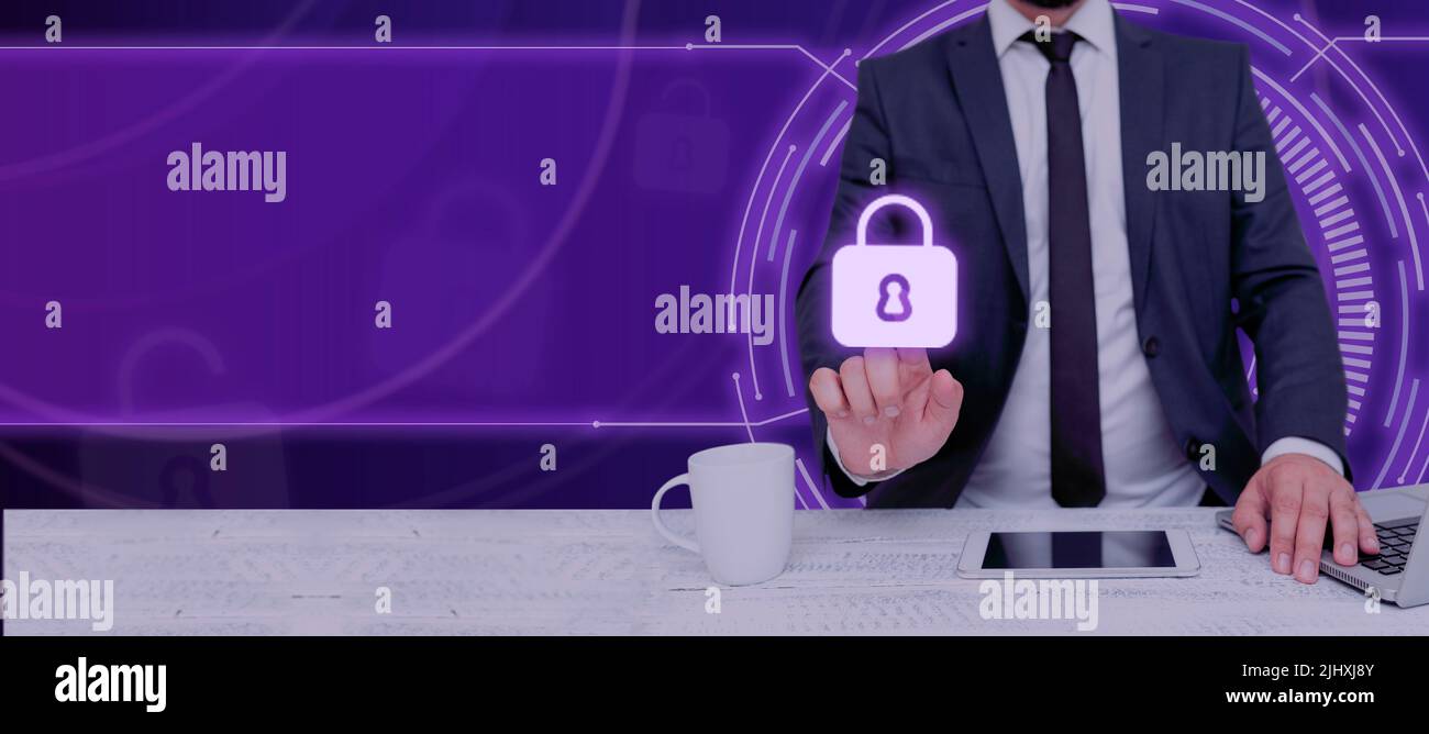 Businessman With Laptop And Tablet Pointing On Lock Symbol For Data ...