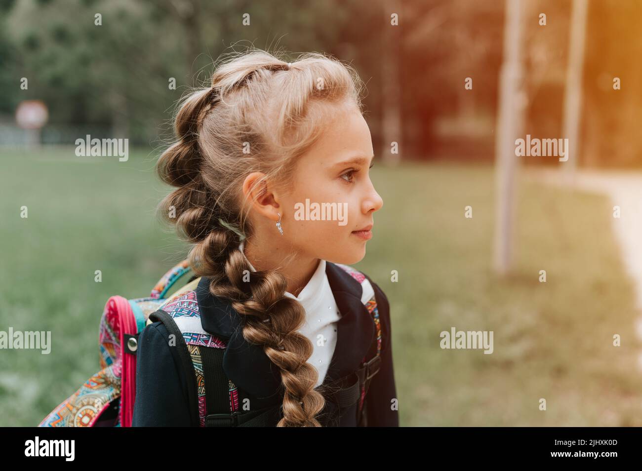 back to school. face portrait little happy kid pupil schoolgirl eight ...