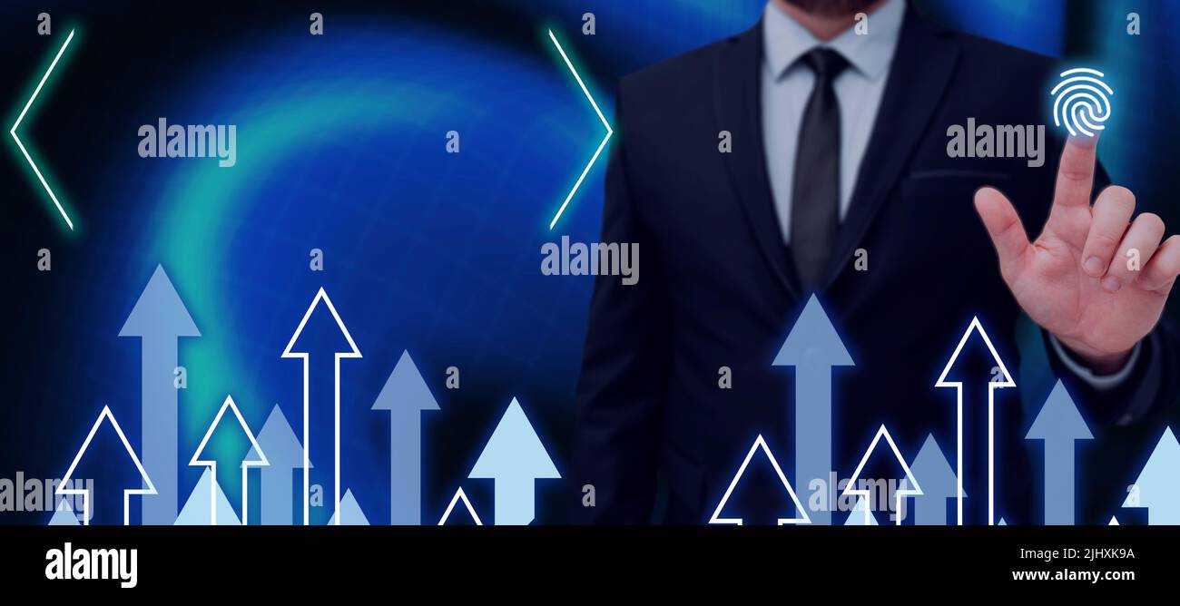 Businessman Pointing On Fingerprint Symbol In A Futuristic Design With ...